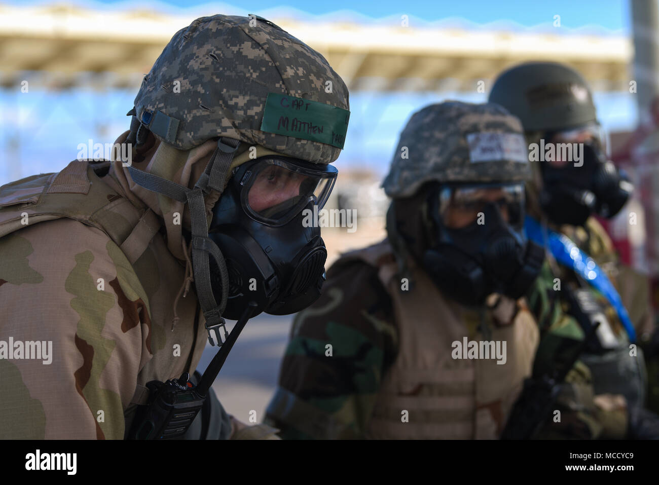 U.S. Airmen discuss strategies on how to effectively sweep the area for ...