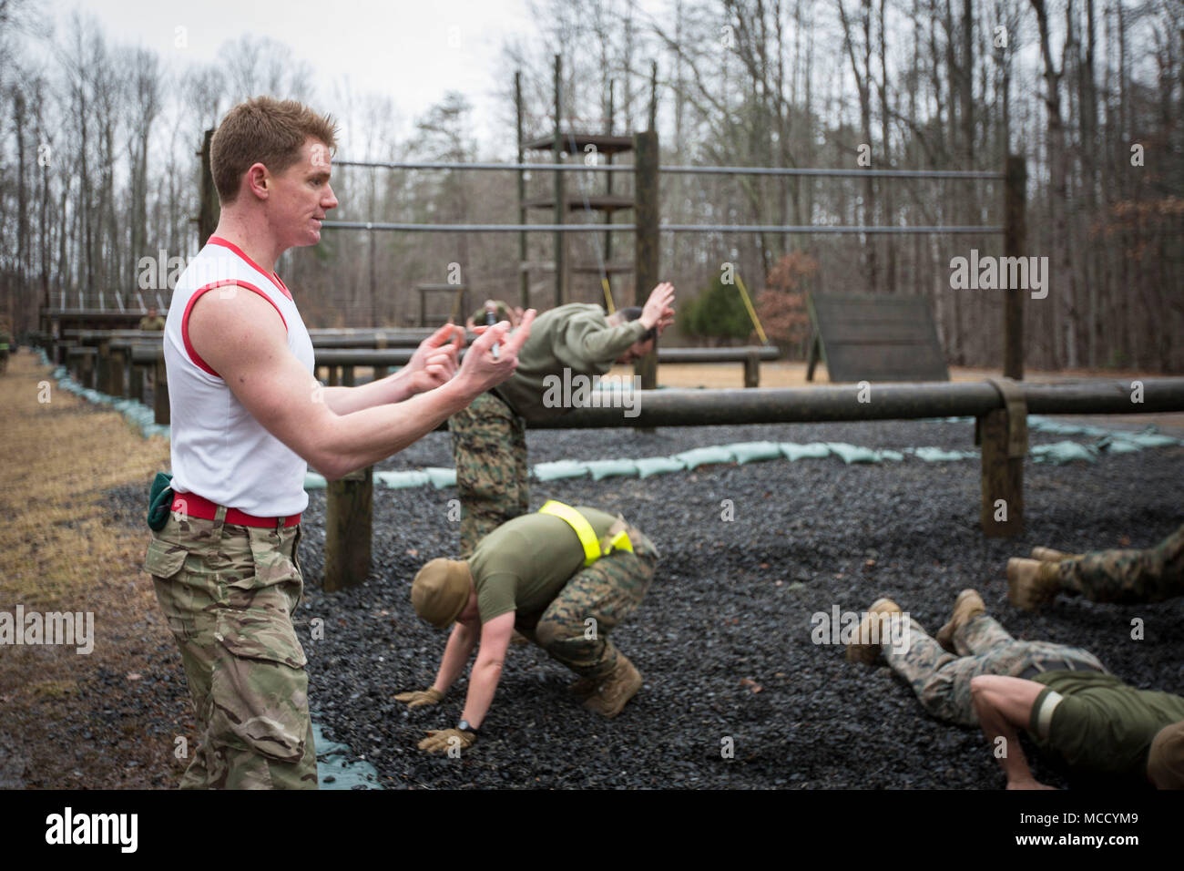 Royal Marine Commando Sgt. Chris Abrams supervises the conduct of the ...