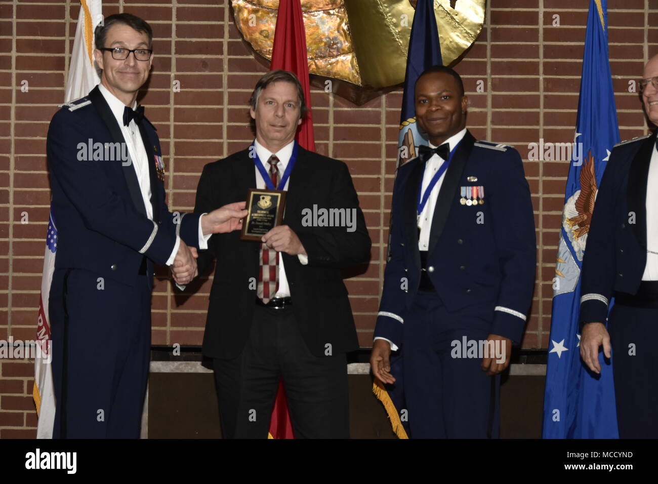 Col. Scott Cain, Arnold Engineering Development Complex commander, left ...