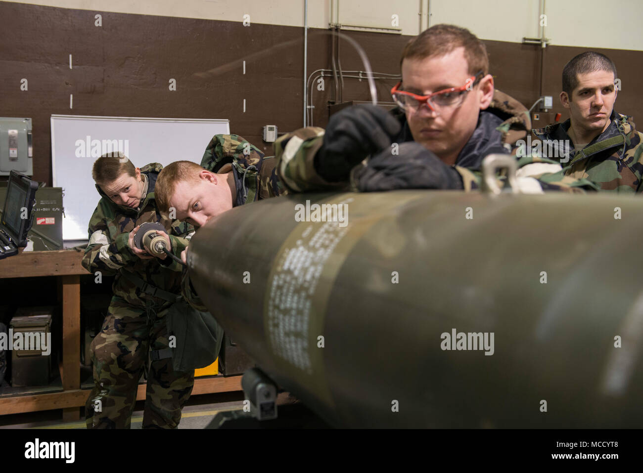 Air Force munitions crew chiefs with the 477th Maintenance Squadron ...