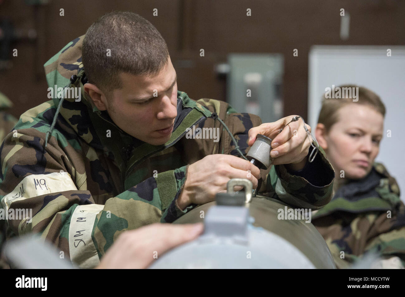 Air Force munitions crew chiefs with the 477th Maintenance Squadron ...