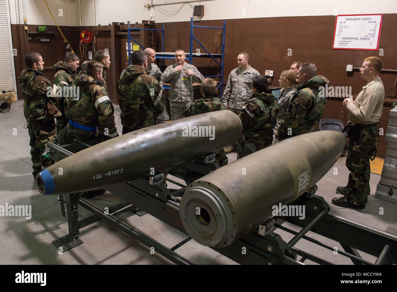 Air Force munitions crew chiefs with the 477th Maintenance Squadron are ...