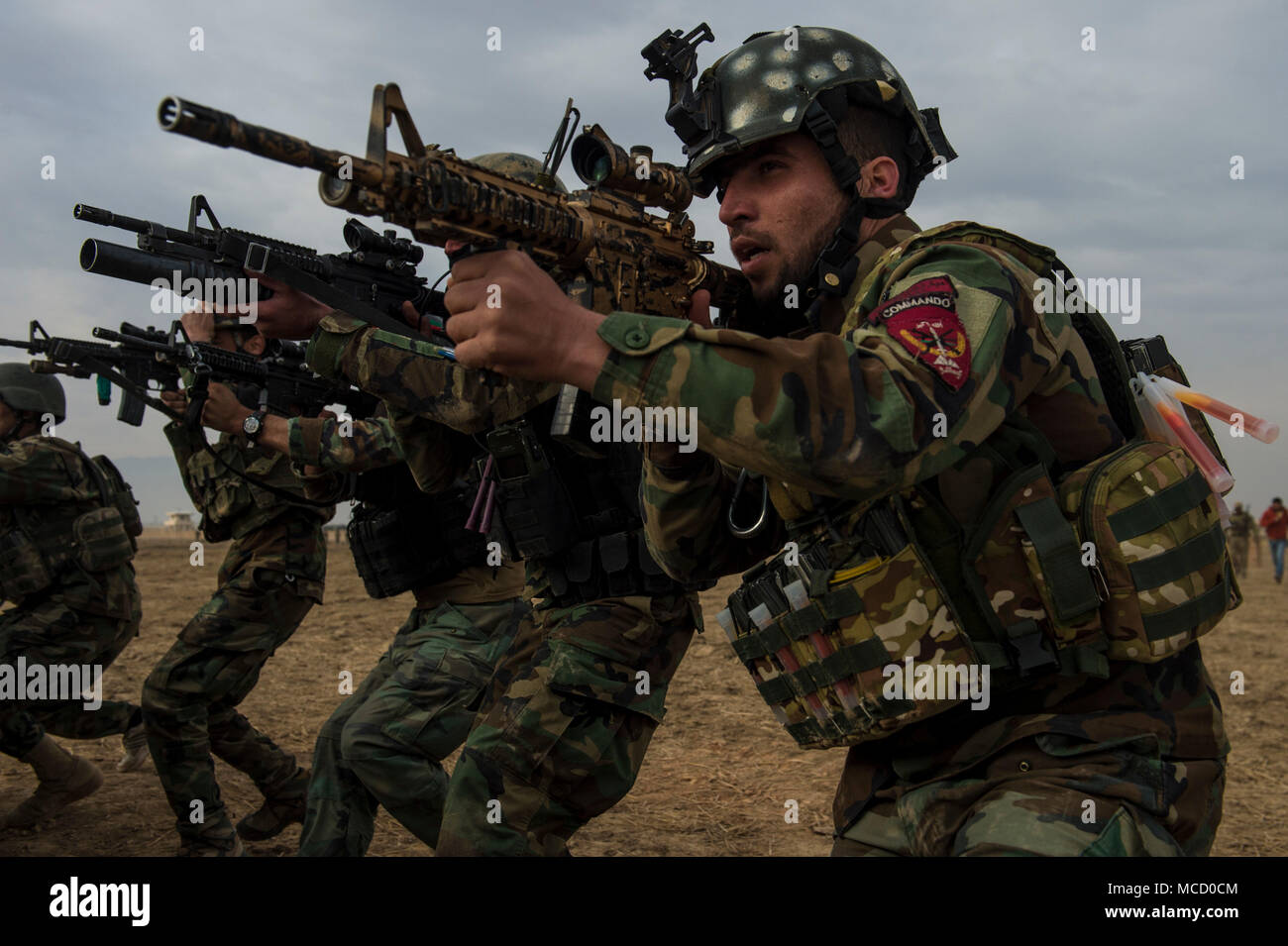 An Afghan National Army Commando squad conducts live fire exercises ...