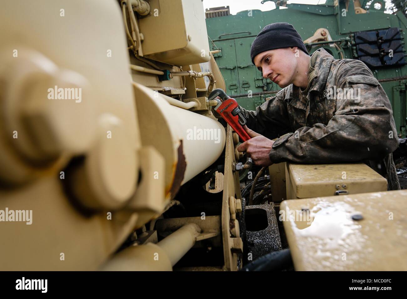 Pfc. Michael Korol, an Atlanta, Georgia native and a wheeled vehicle ...