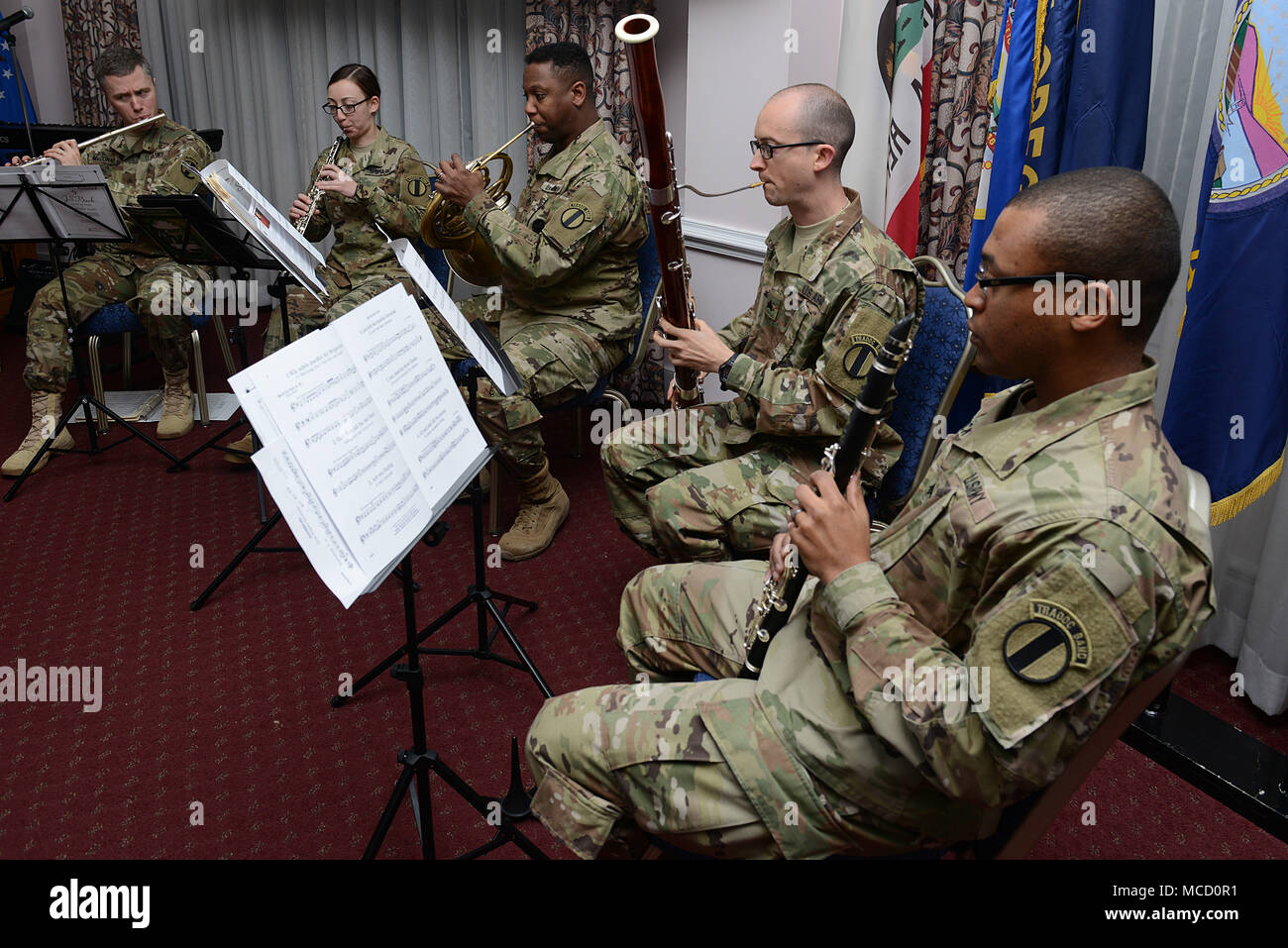 The U.S. Army Training and Doctrine Command Band performs during the ...