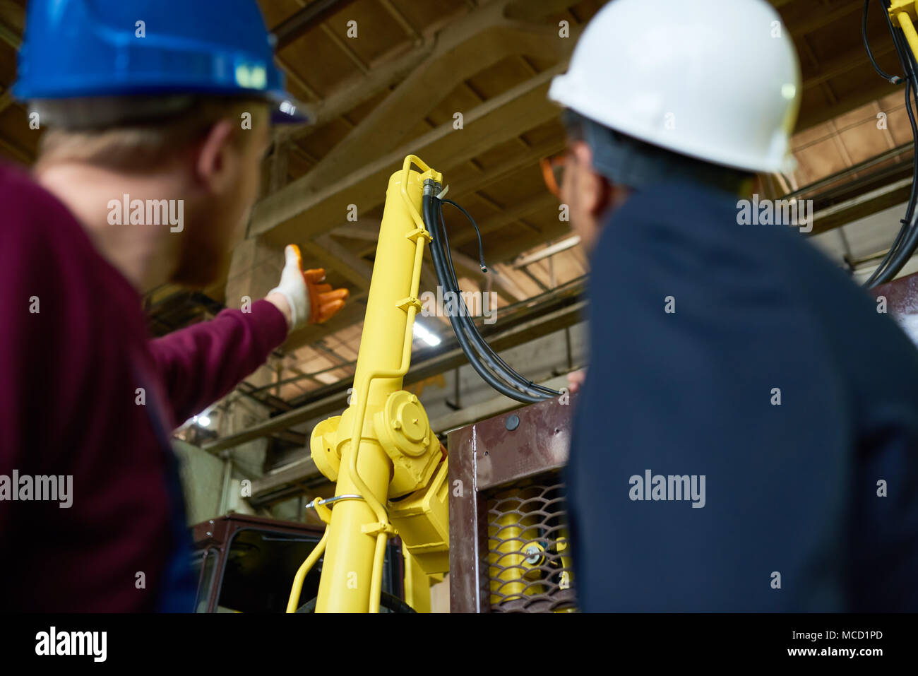 Explaining Something to Superior Stock Photo - Alamy