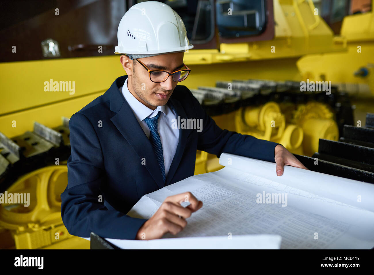 Studying blueprint hi-res stock photography and images - Alamy