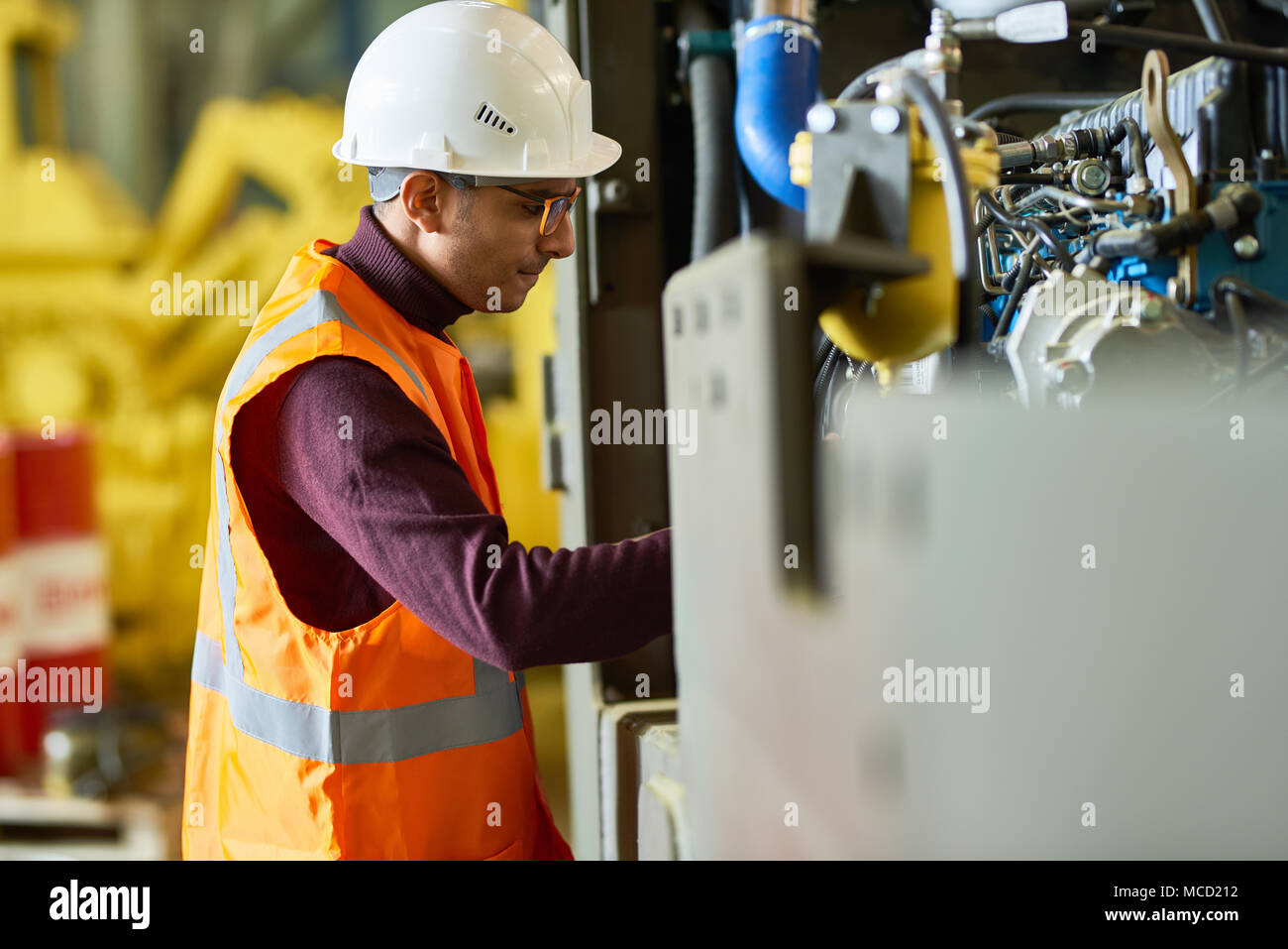 Operating Machine at Production Department Stock Photo - Alamy