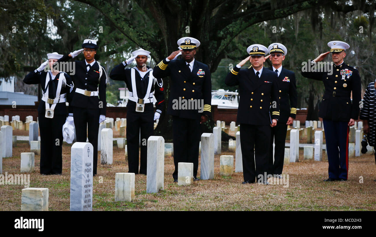 Marines and Sailors salute the headstone of Petty Officer 1st Class ...