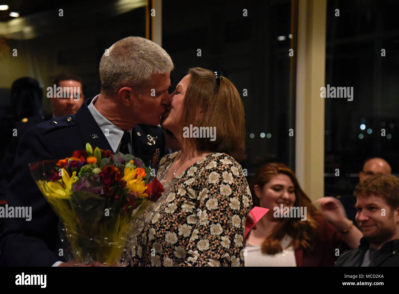 Air Force Brig. Gen. Paul Johnson, 175th vice wing commander, kisses ...