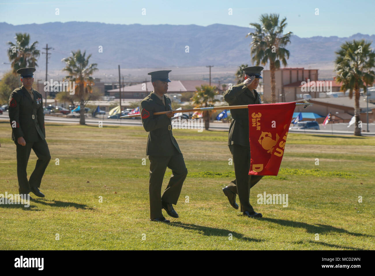 The company guidon and commander of D Company "Dragoons" lead the ...