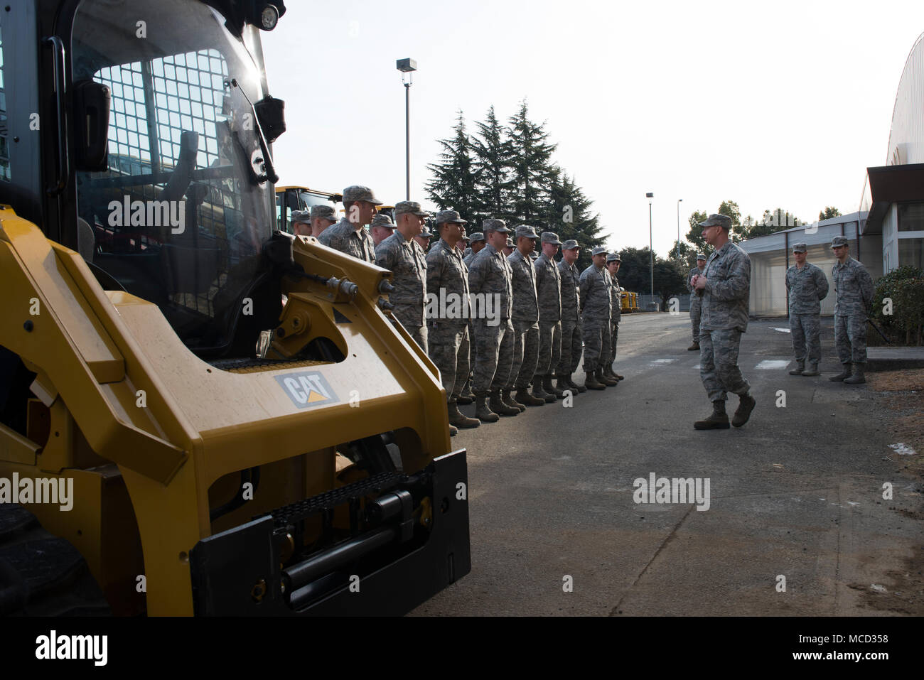 Col. John Winkler, 374th Mission Support Group commander, addresses ...
