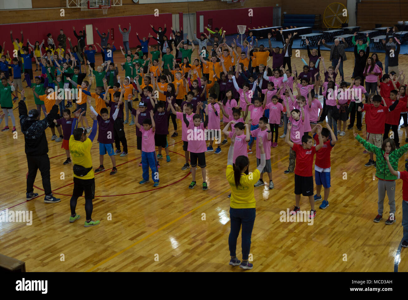 CAMP HANSEN, OKINAWA, JAPAN – Children warm-up during a Japan-U.S ...