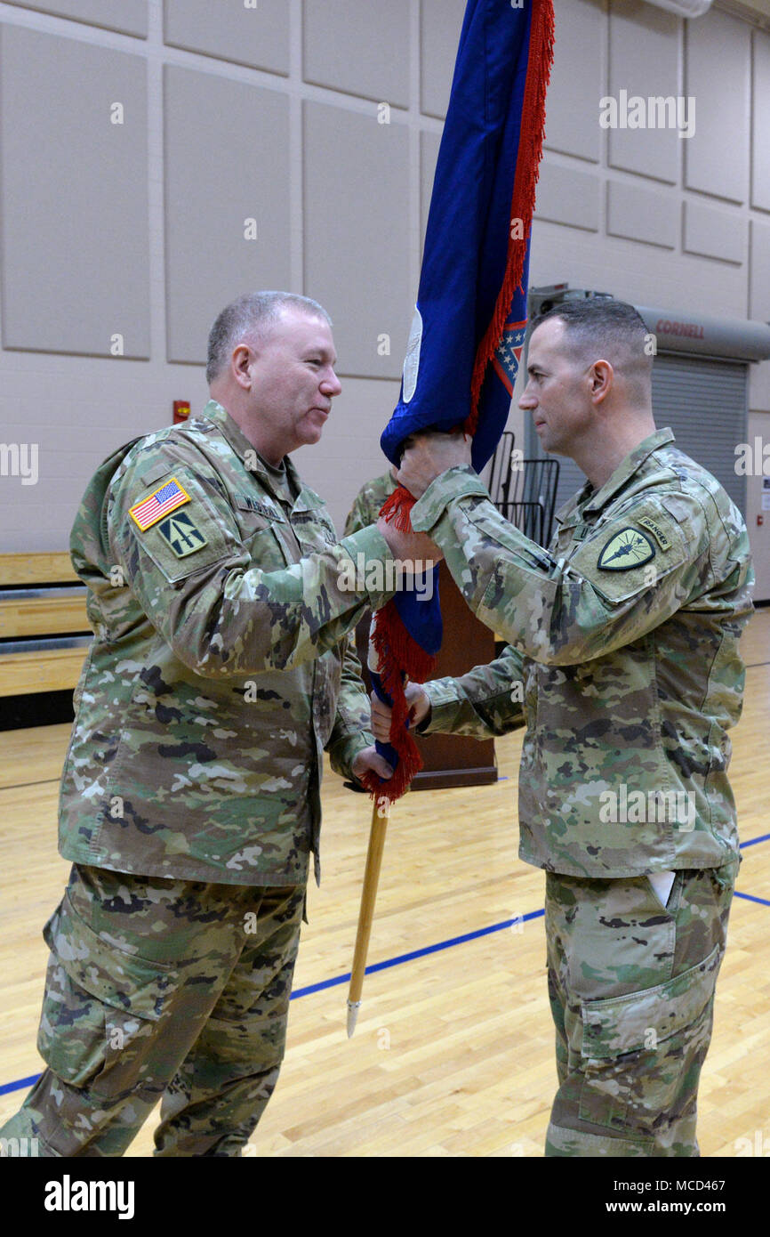 Indiana Army National Guard Lt. Col. John Pitt, right, receives the ...