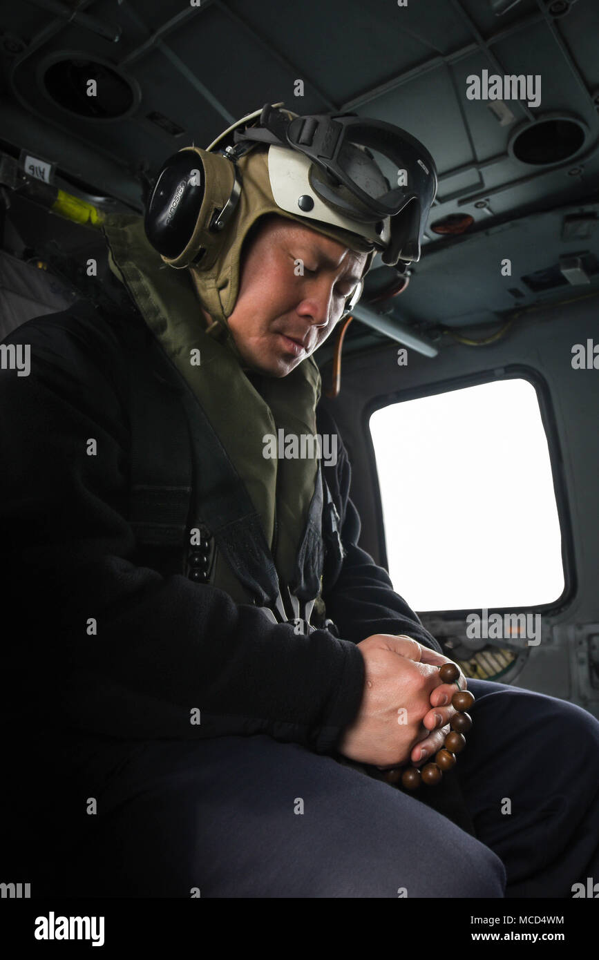 180214-N-VN584-1276 ARABIAN GULF (Feb. 14, 2018) Lt. Long Nguyen, a ...