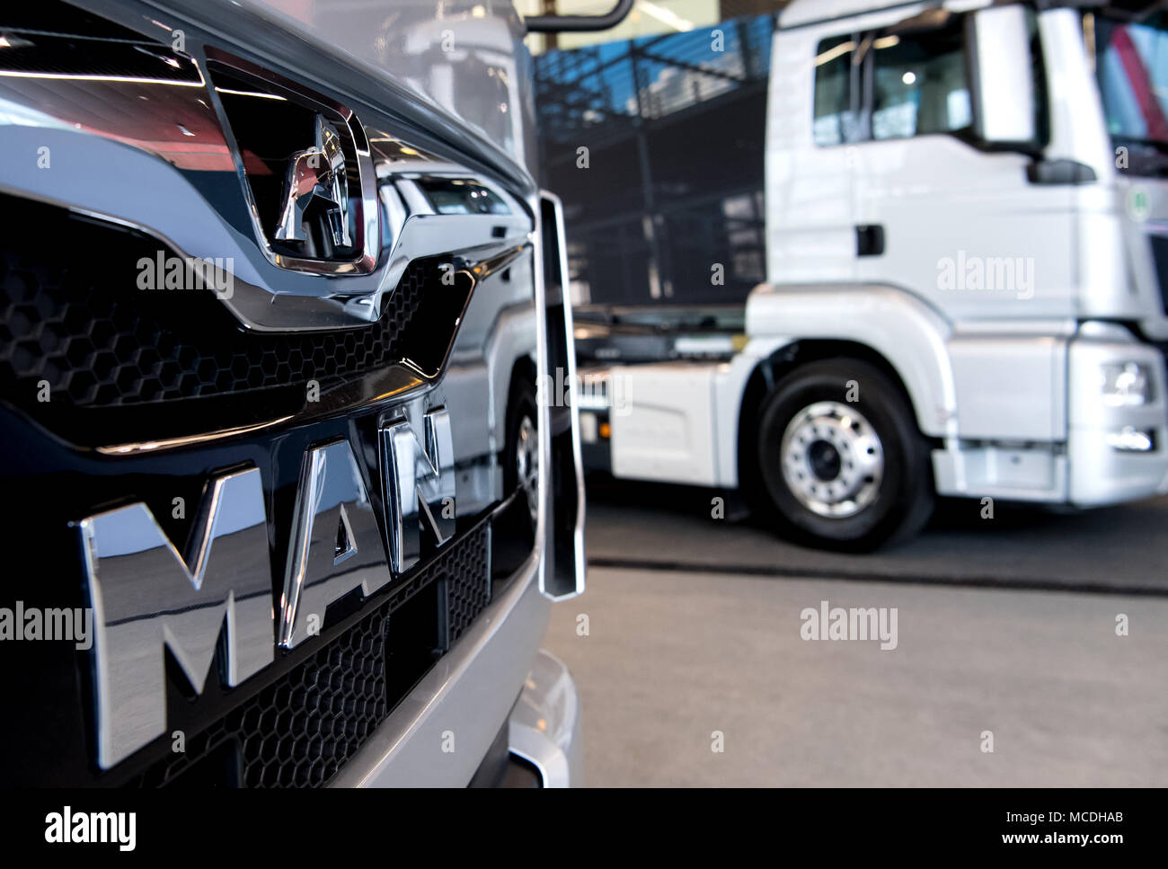 16 April 2018, Germany, Munich: Two MAN trucks at the MAN Forum ...