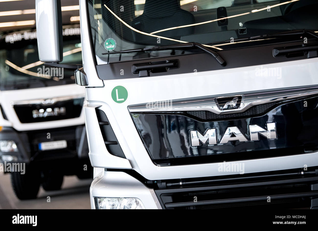 16 April 2018, Germany, Munich: Two MAN trucks at the MAN Forum ...