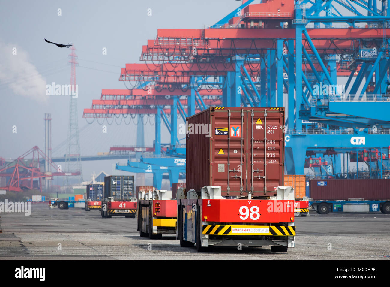 16 April 2018, Germany, Hamburg: Automatic container transporters (AGV ...