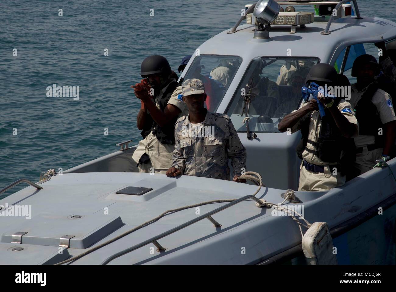 Members of the Somali maritime police and Djibouti coast guard ...