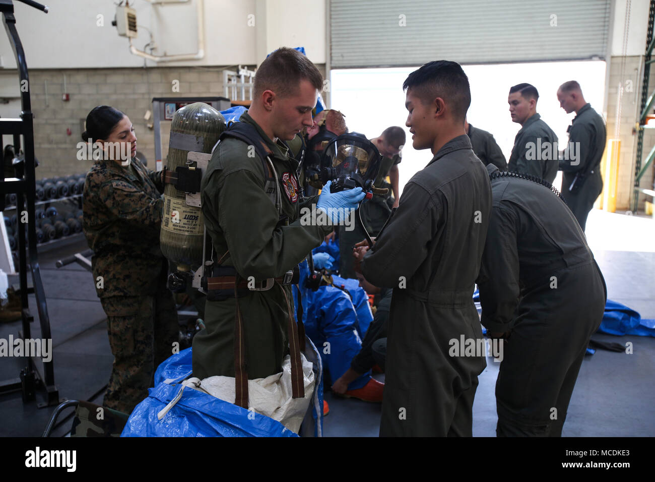 Marines with Aircraft Rescue and Firefighting (ARFF) prepare to ...