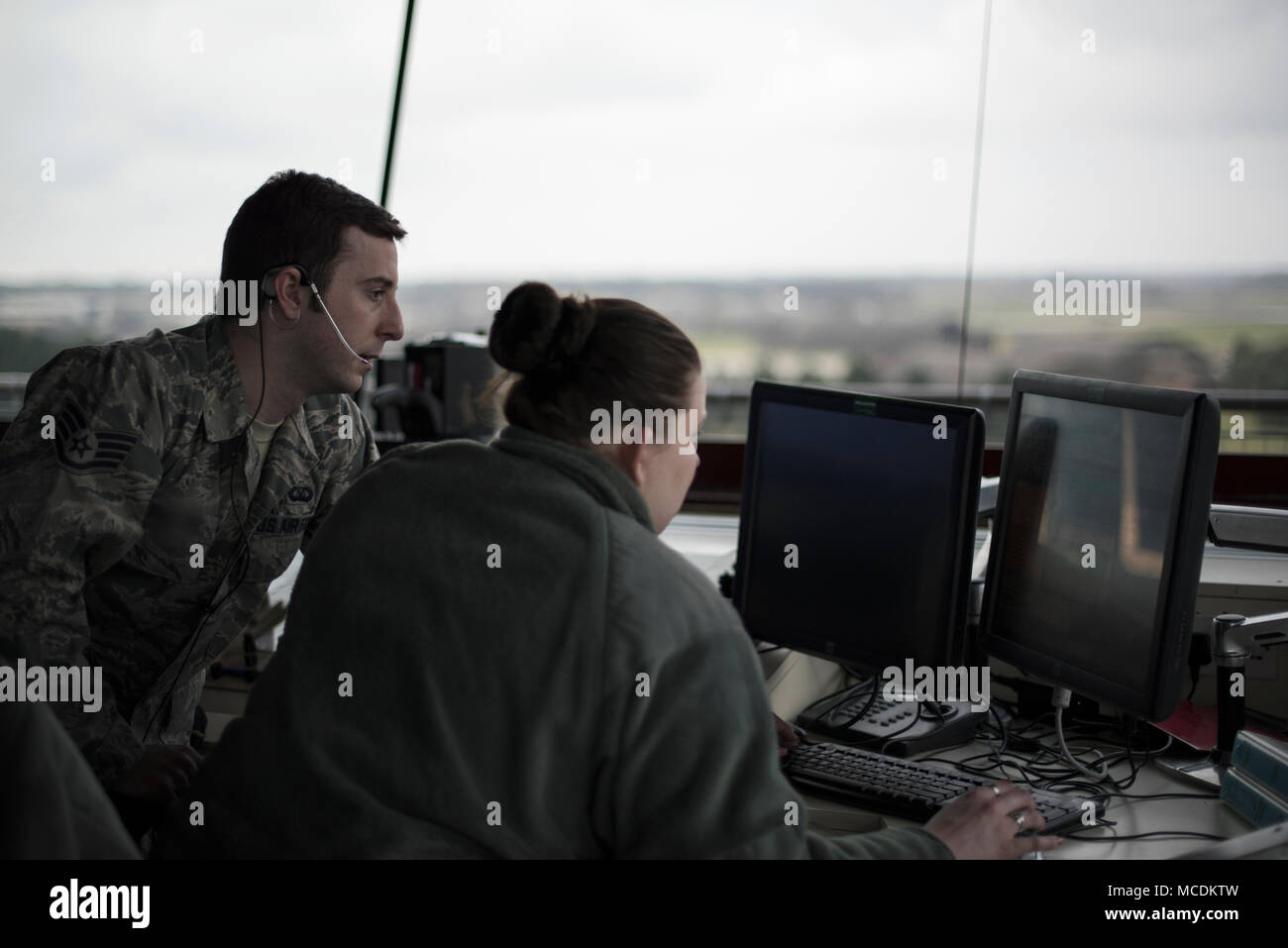 Airmen from the 48th Operations Support Squadron air traffic control tower prepares for F-15s to ...
