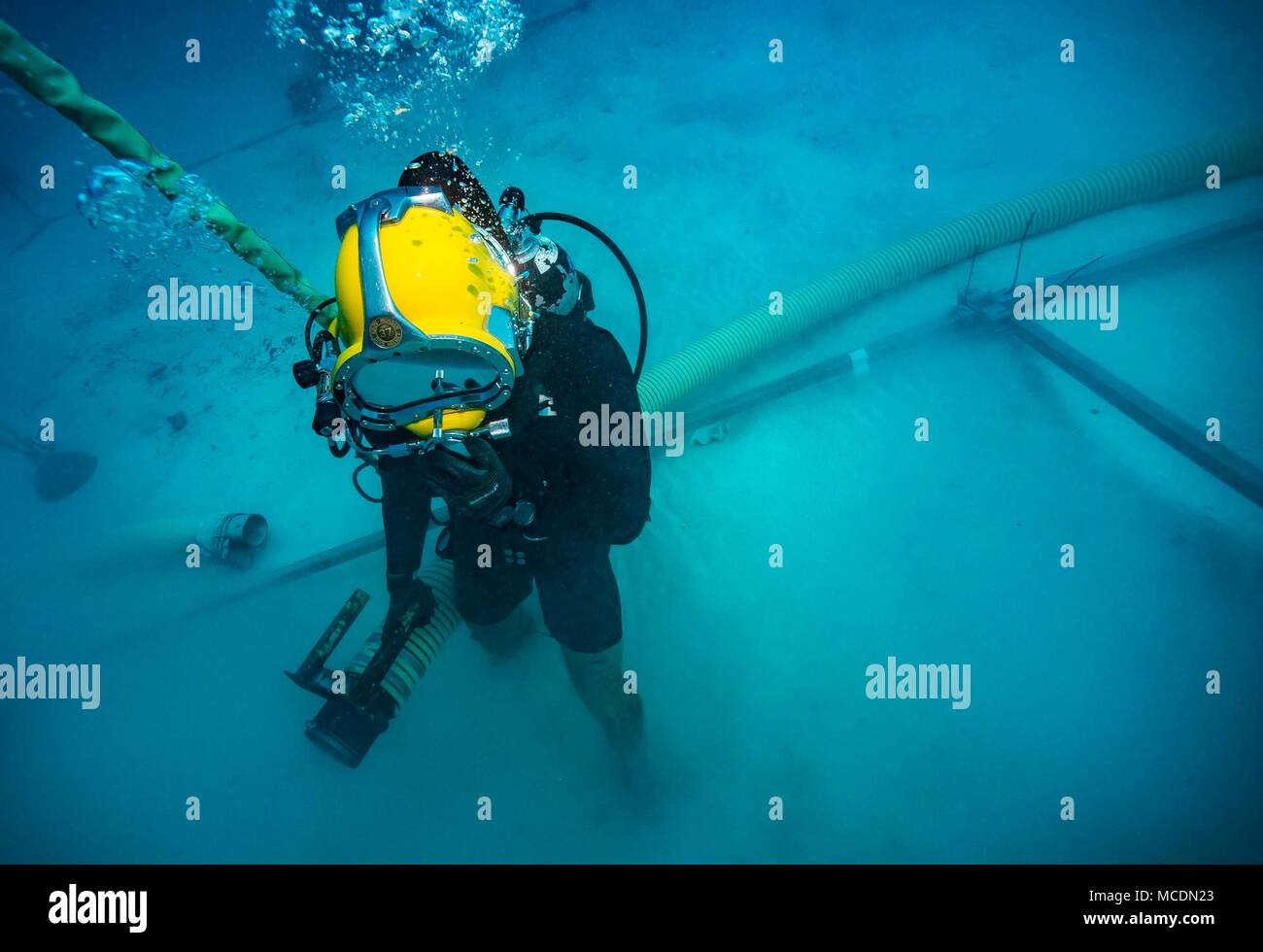 Navy Diver 2nd Class Alec Stuller, assigned to Mobile Diving and ...