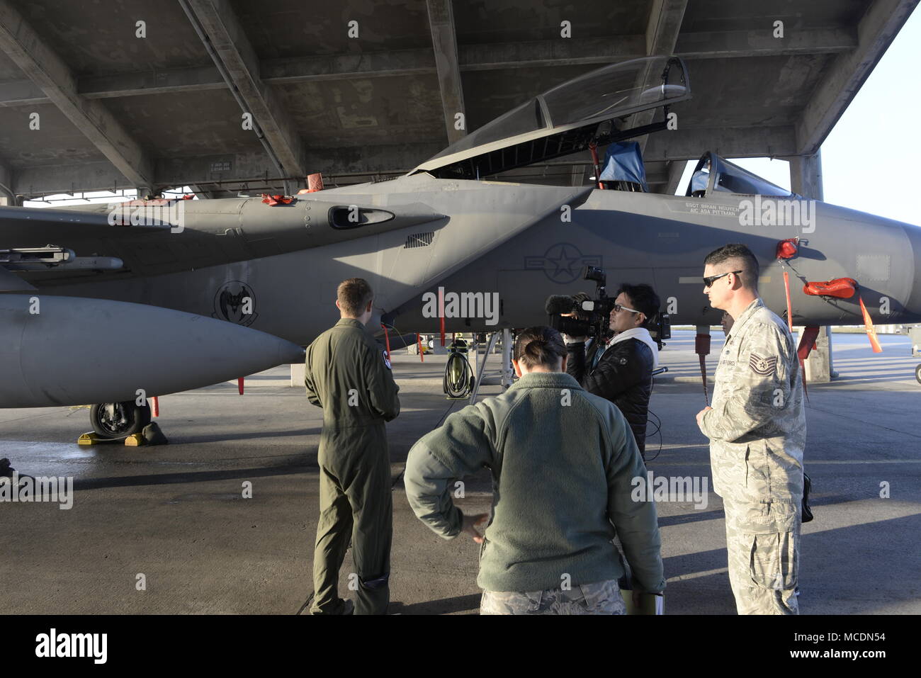 U.S. Air Force Capt. Brock McGehee, 44th Fighter Squadron pilot, is interviewed by NHK Japan ...