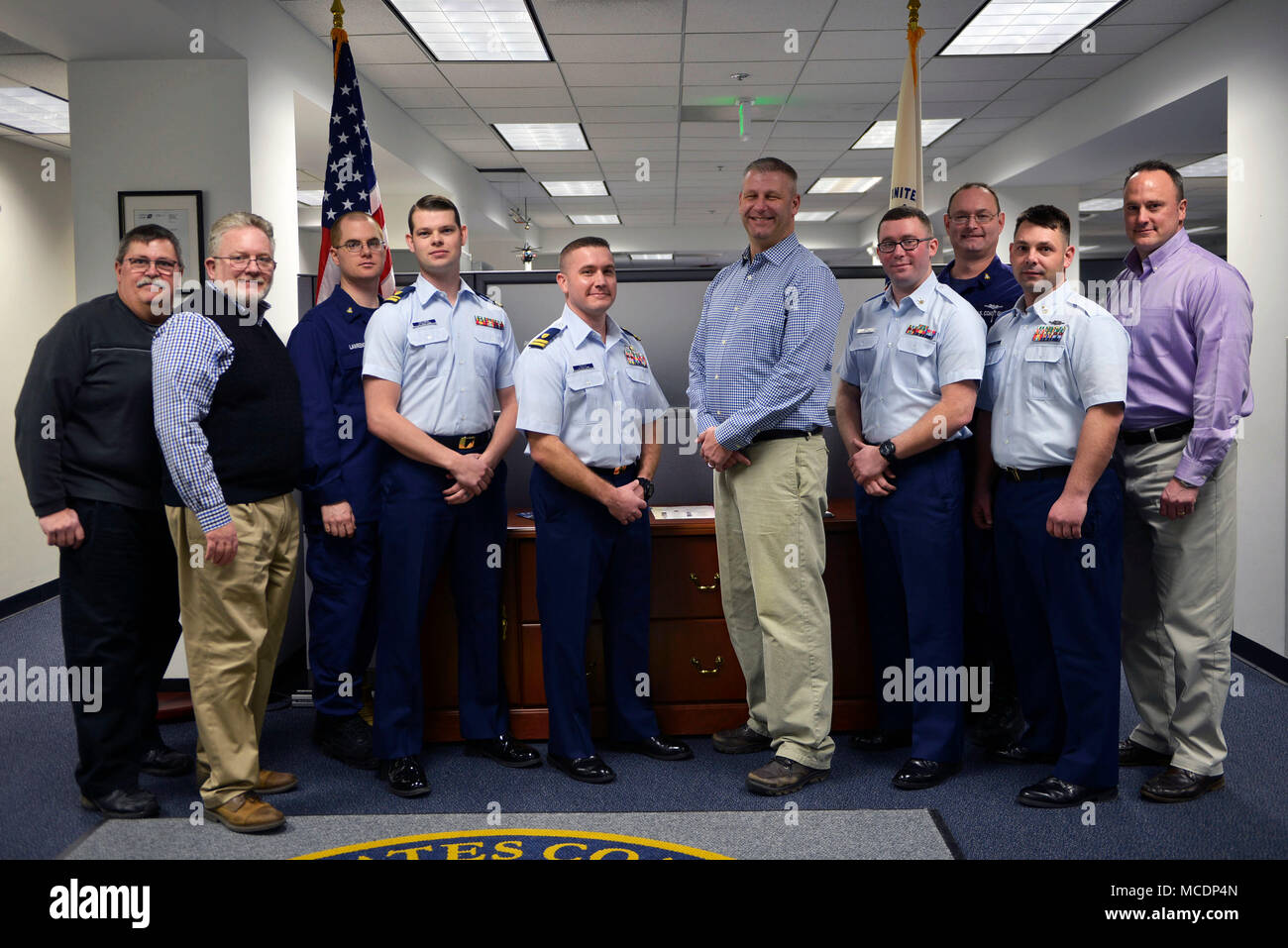 Members of Coast Guard Base Boston's C4IT staff gather for a group ...