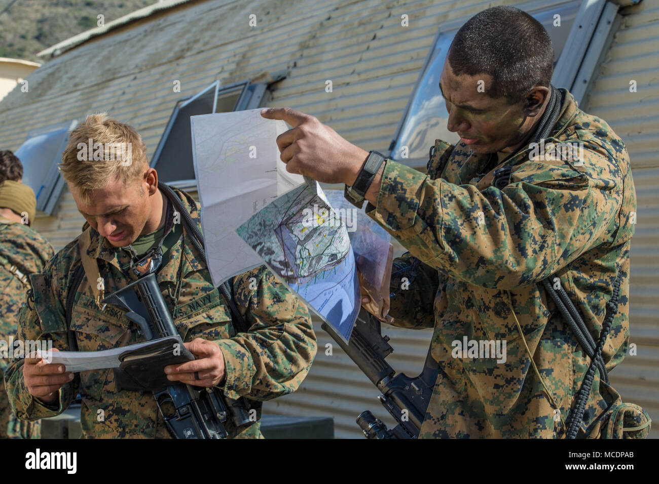U.S. Navy HM Wayne Jaworski and HM3 Andres Rodoni, corpsmen with Class ...