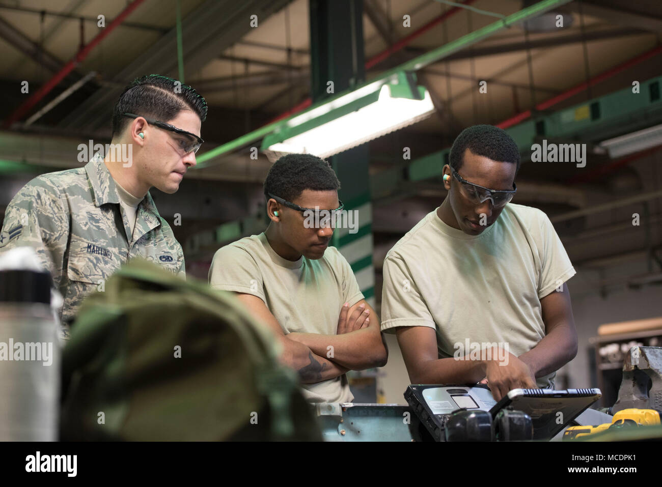 U.S. Air Force Airman 1st Class’ Gilbert Martinez, left, Denzel ...