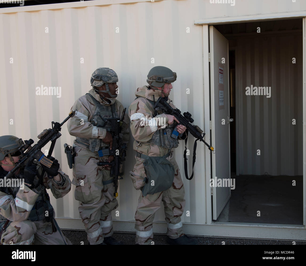 Airmen from the 366th Security Forces Squadron prepare to clear a ...