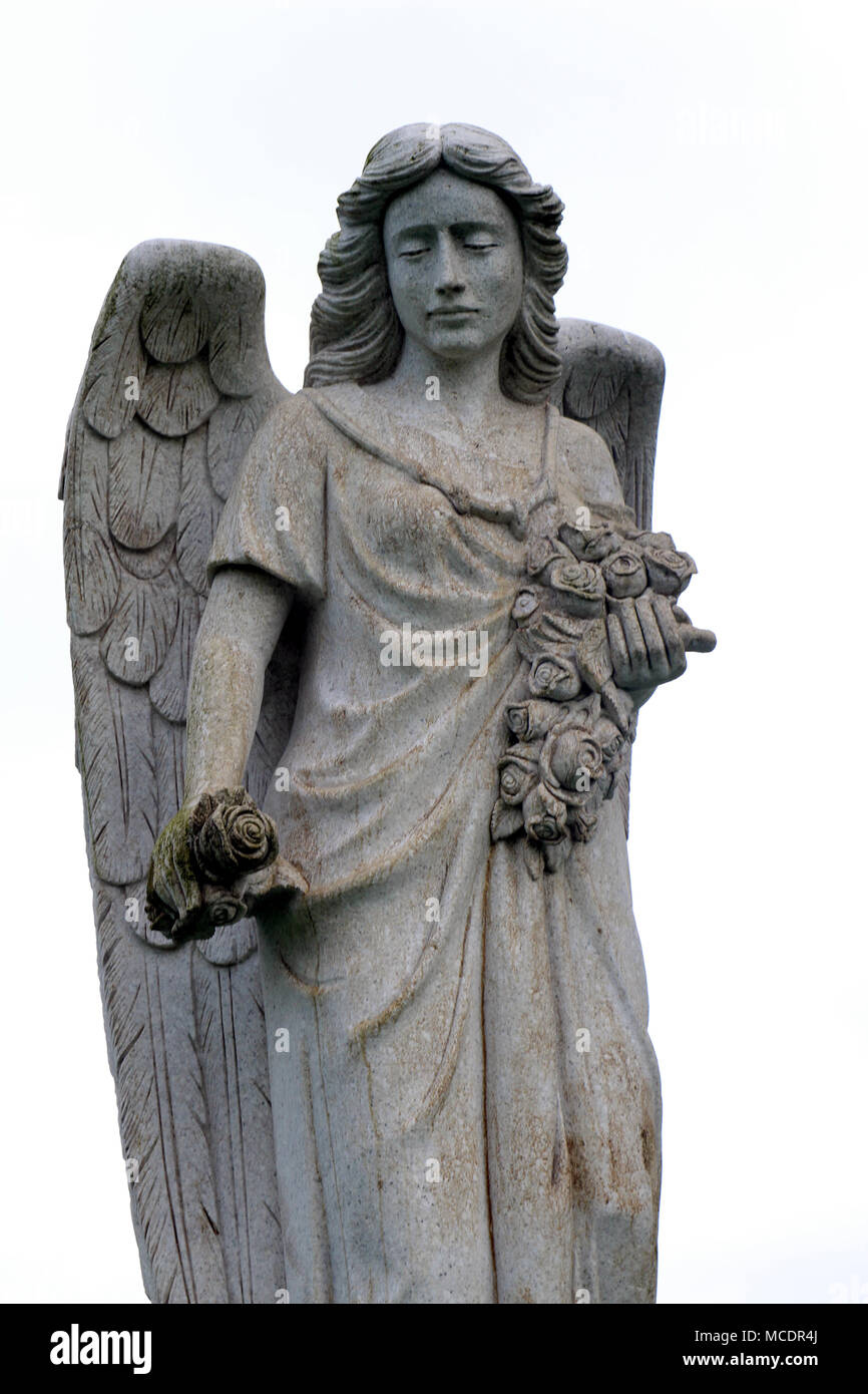 Statue holding flowers hi-res stock photography and images - Alamy