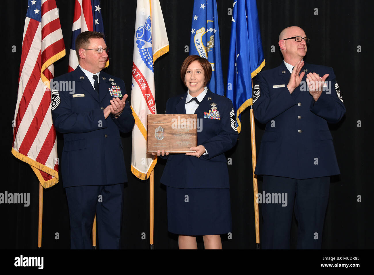 Command Chief Master Sgt. Thomas A. Jones, left, the state command ...