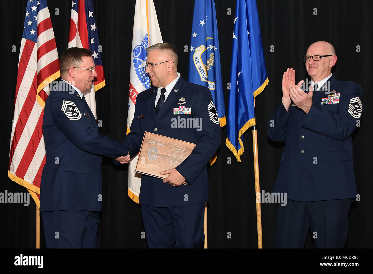Chief Master Sgt. Joseph J. O'Neil, center, assigned to the 179th ...