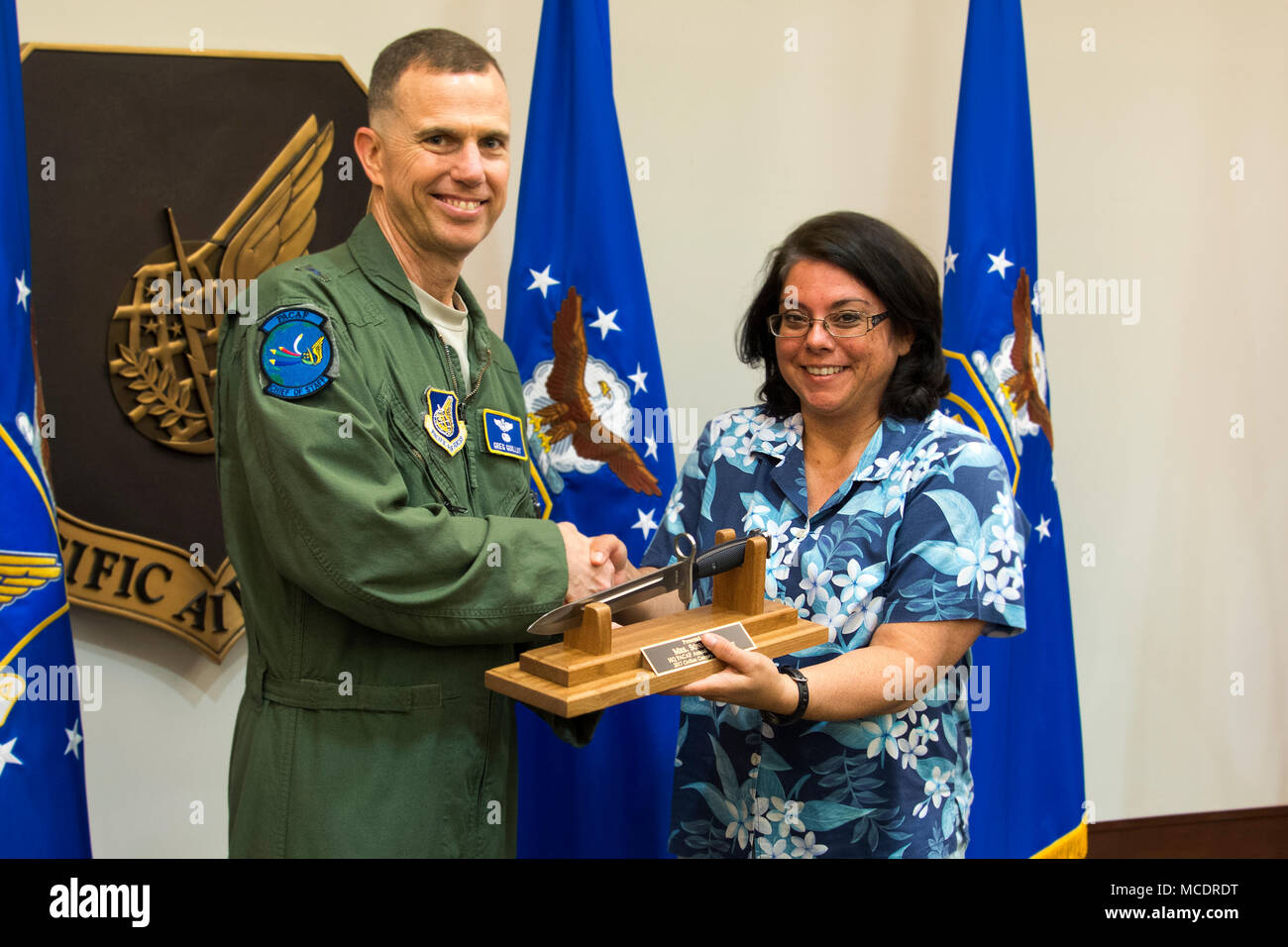 Sonia Burk is presented with the 2017 Civilian Category II of the Year ...