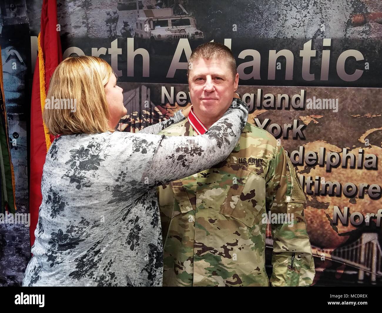 Wife Jan Hailey (left) presents her husband, Col. Robert Hailey (right ...