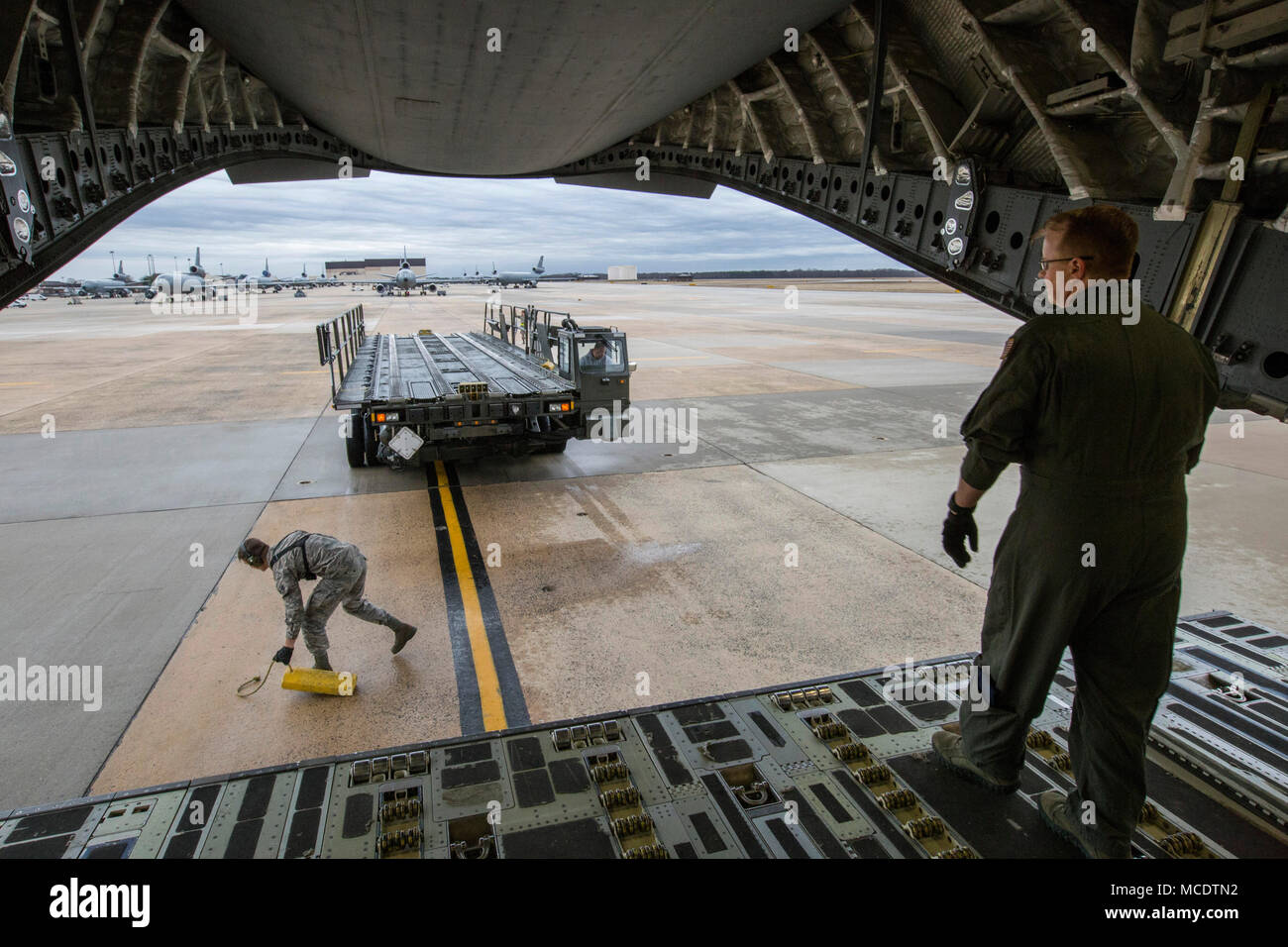 U.S. Air Force Master Sgt. Nicholas R. Brehm, right, a C-17 Globemaster ...