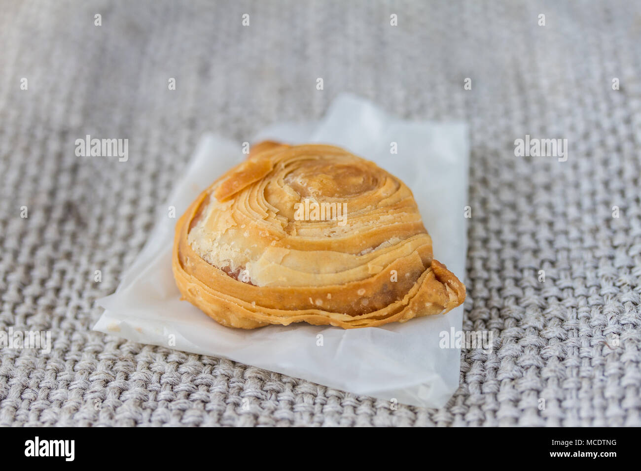 Image of curry puff in white paper on sack background Stock Photo - Alamy