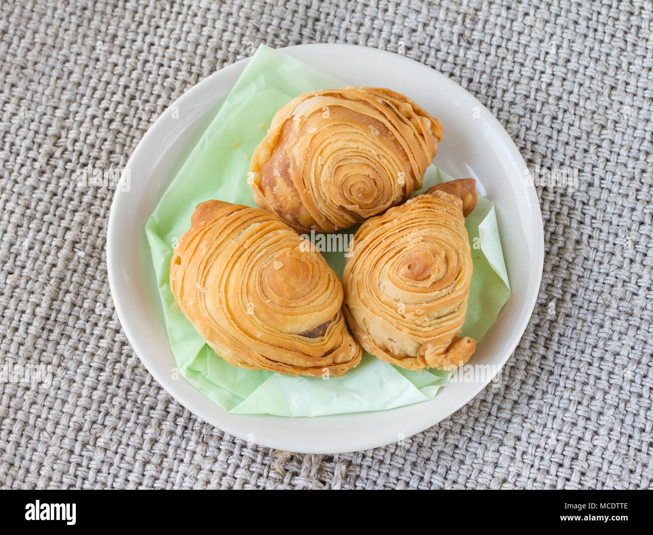 Image of curry puff in white ceramic dish on sack background Stock ...