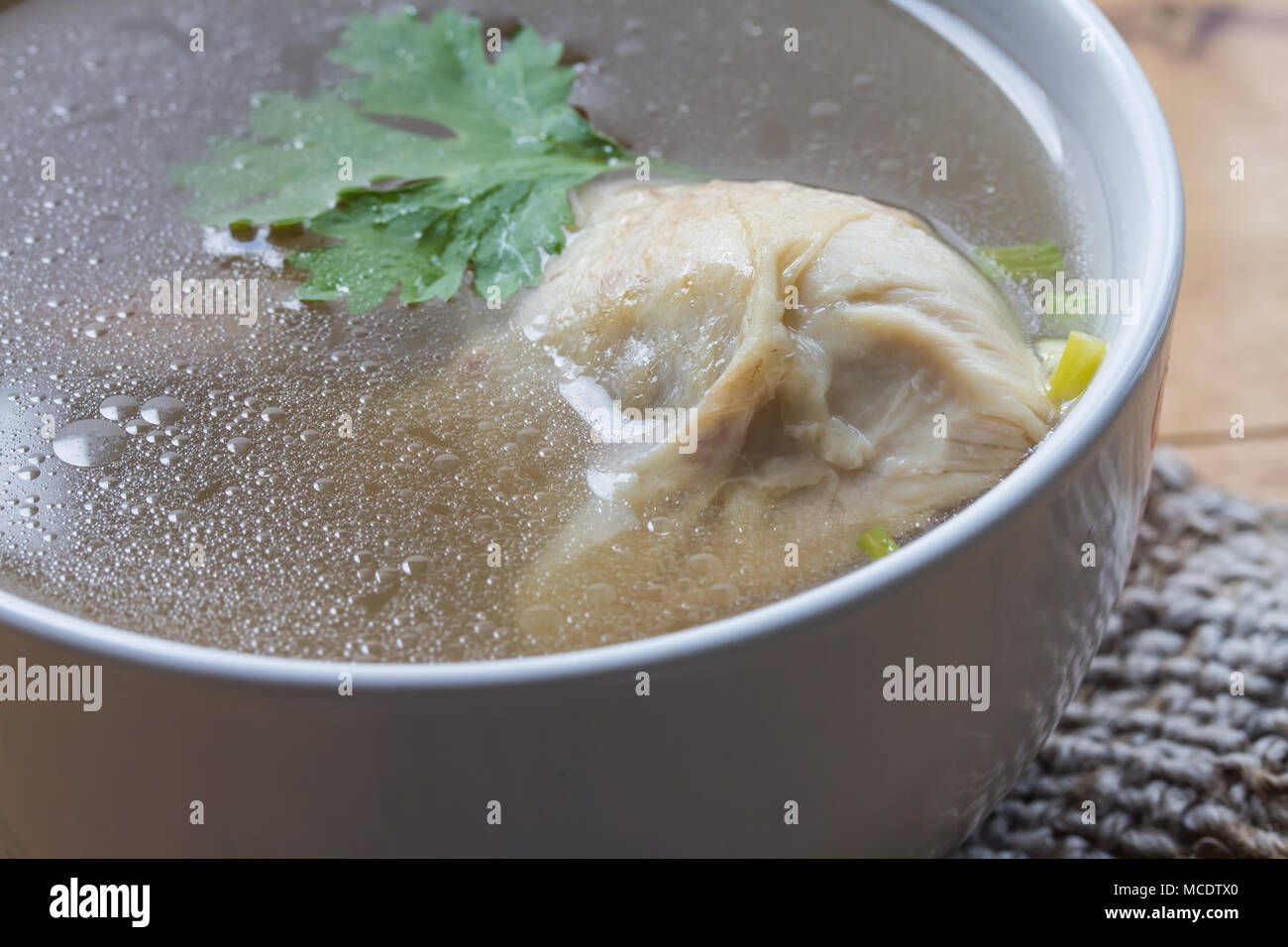 chicken soup, chicken soup on table background Stock Photo - Alamy