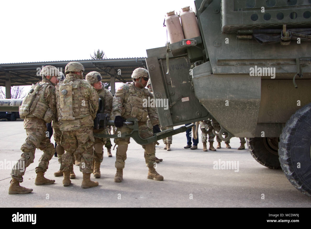 A howitzer crew from Archer Battery, Field Artillery Squadron, 2d ...