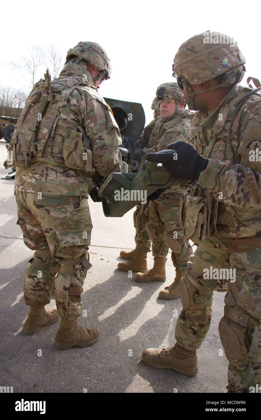 A howitzer crew from Archer Battery, Field Artillery Squadron, 2d ...