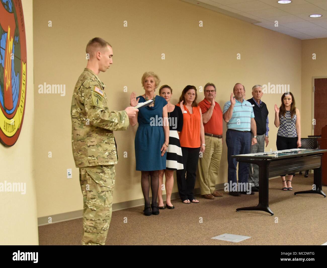 Seven newly inducted honorary commanders swear in during the Honorary ...