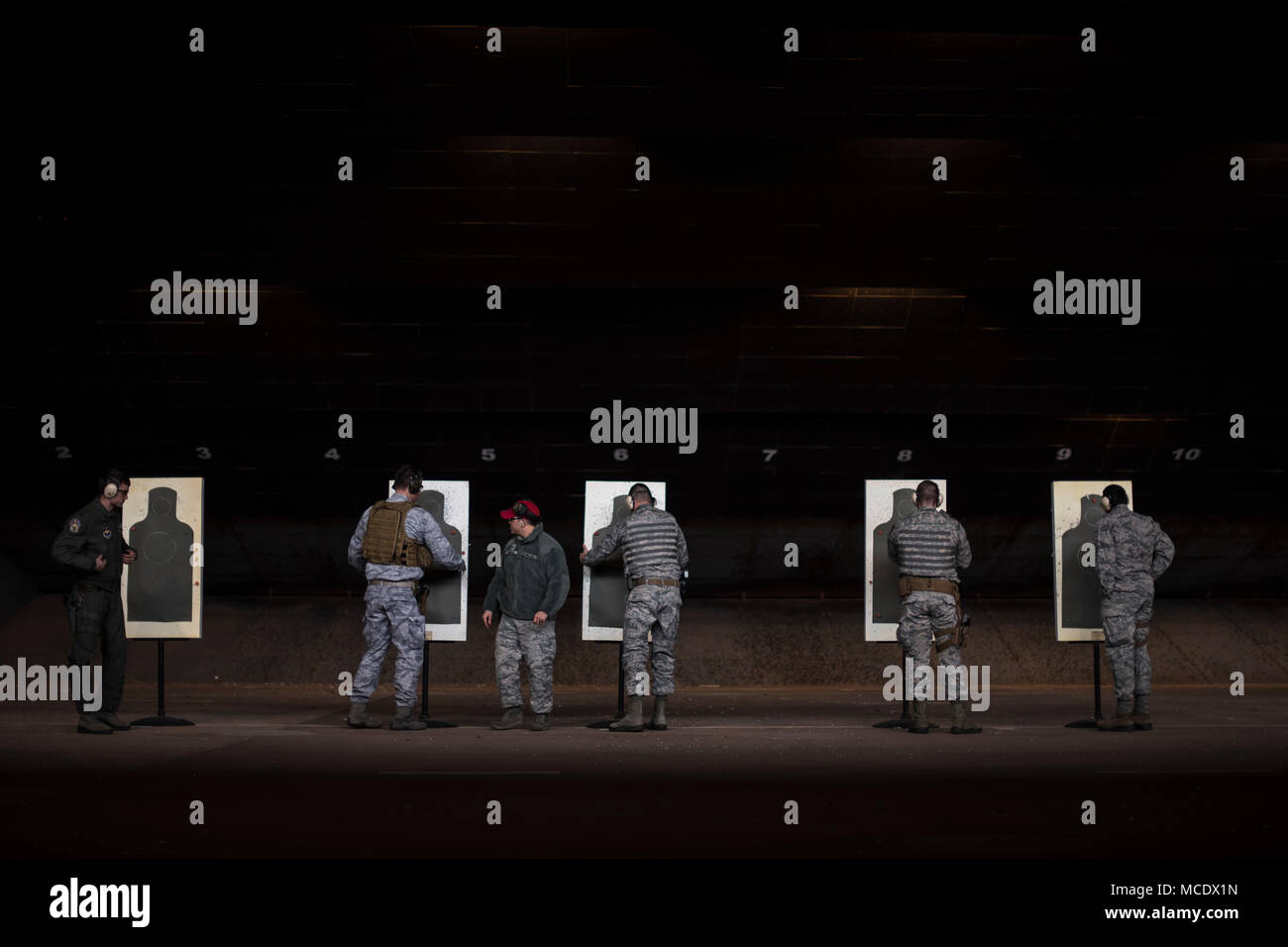 Airmen from the 71st Flying Training Wing adjust thier targets at the ...