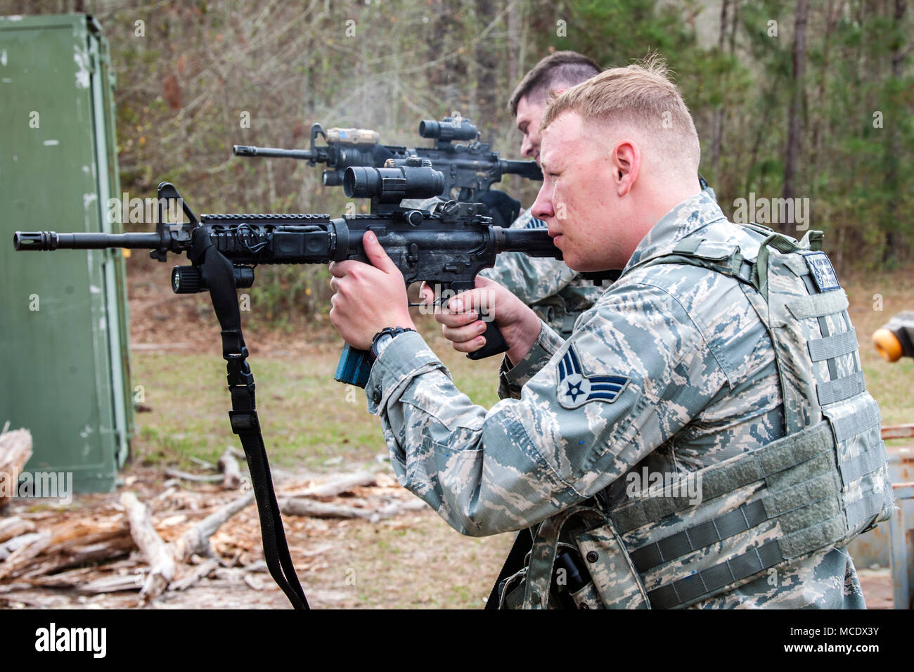 Senior Airman Adam Irwin, front, 23d Security Forces Squadron ...