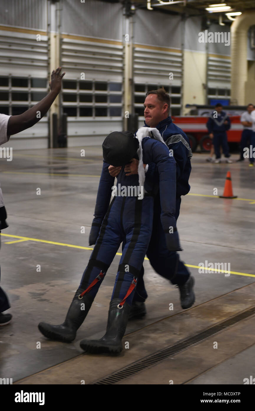 U.S. Air Force Col. David Doss, 7th Bomb Wing vice commander, carries a ...