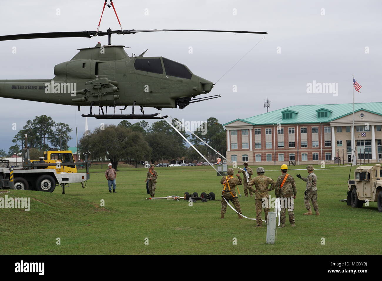 The Fort Stewart main gate static display AH-1 Cobra comes in for one ...