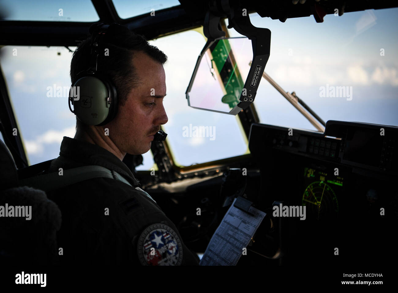 U.S. Air Force Captain Ryan Johnson, 36th Airlift Squadron pilot, flies ...
