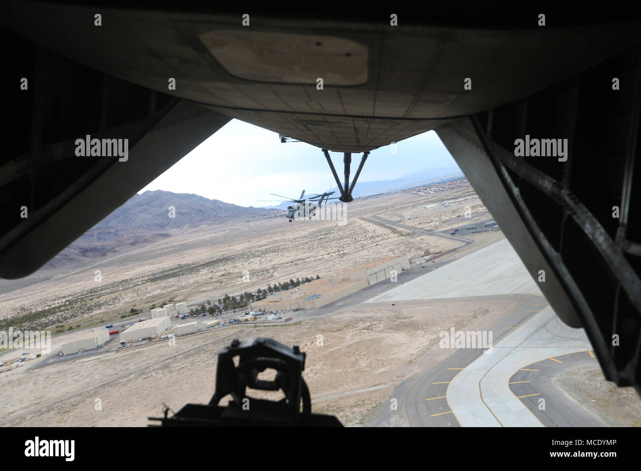 Two CH-53’s from Marine Heavy Helicopter Squadron (HMH) 462 prepare to ...