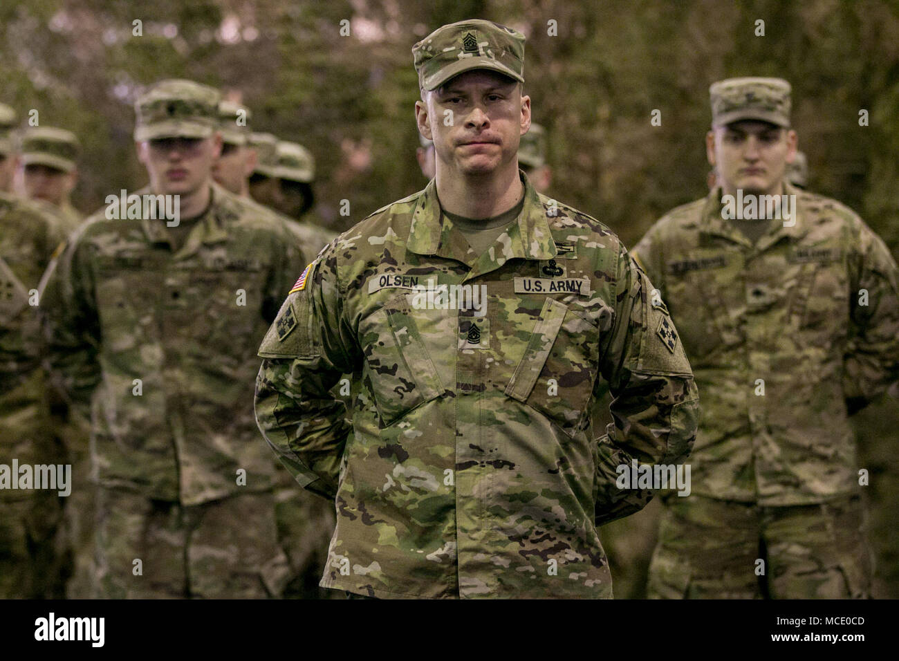 Command Sgt. Maj. Eric B. Olsen, stands in front of a formation of 4th ...